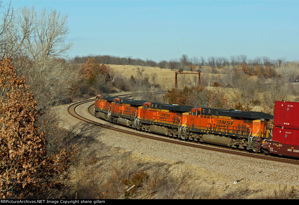 BNSF 7271 Heads up hill at hart mo.